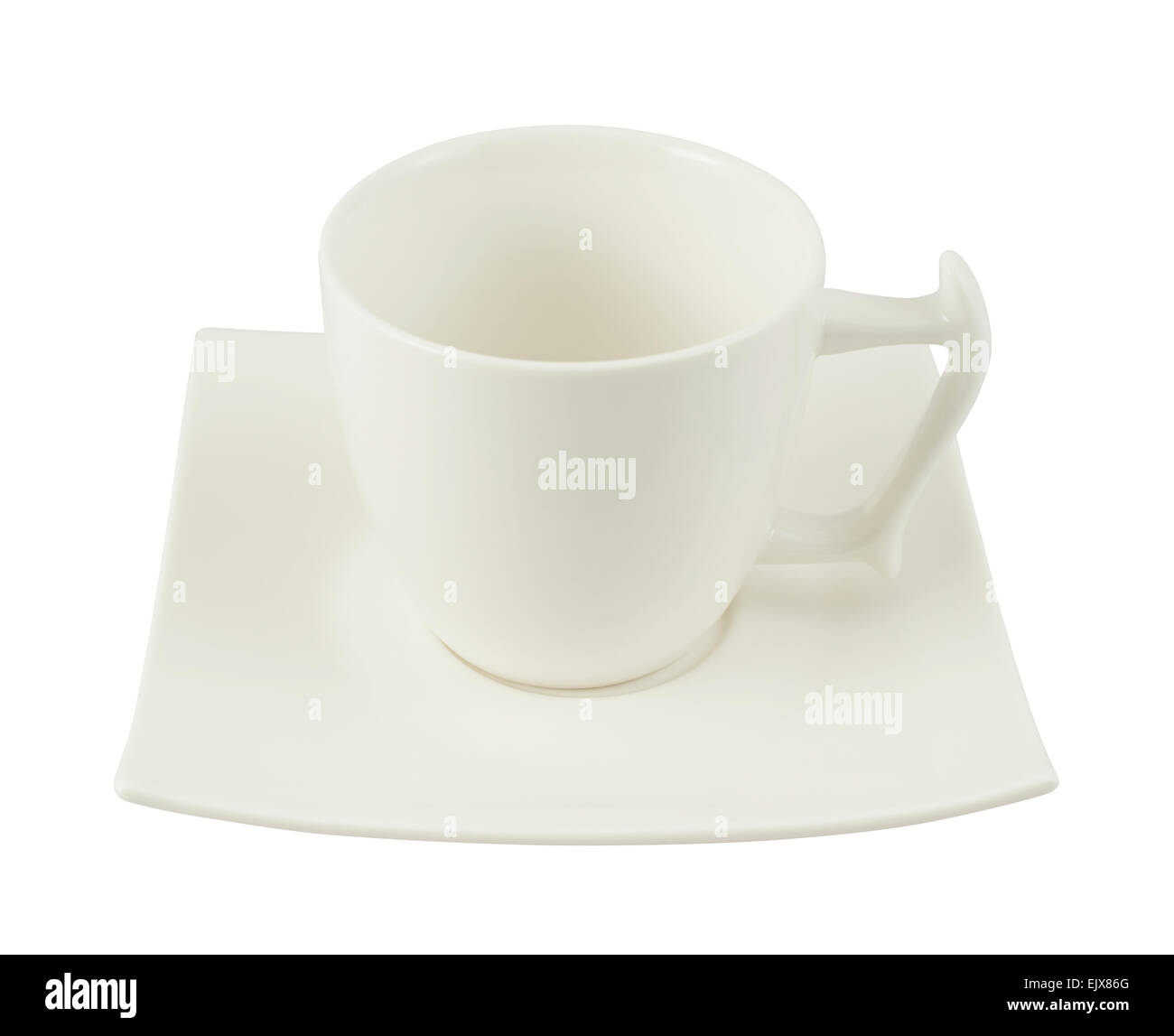Tea cup over a square plate isolated Stock Photo - Alamy