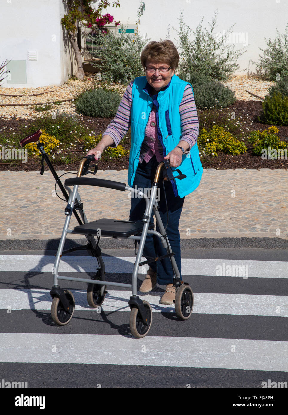 Old lady crossing road Stock Photo - Alamy