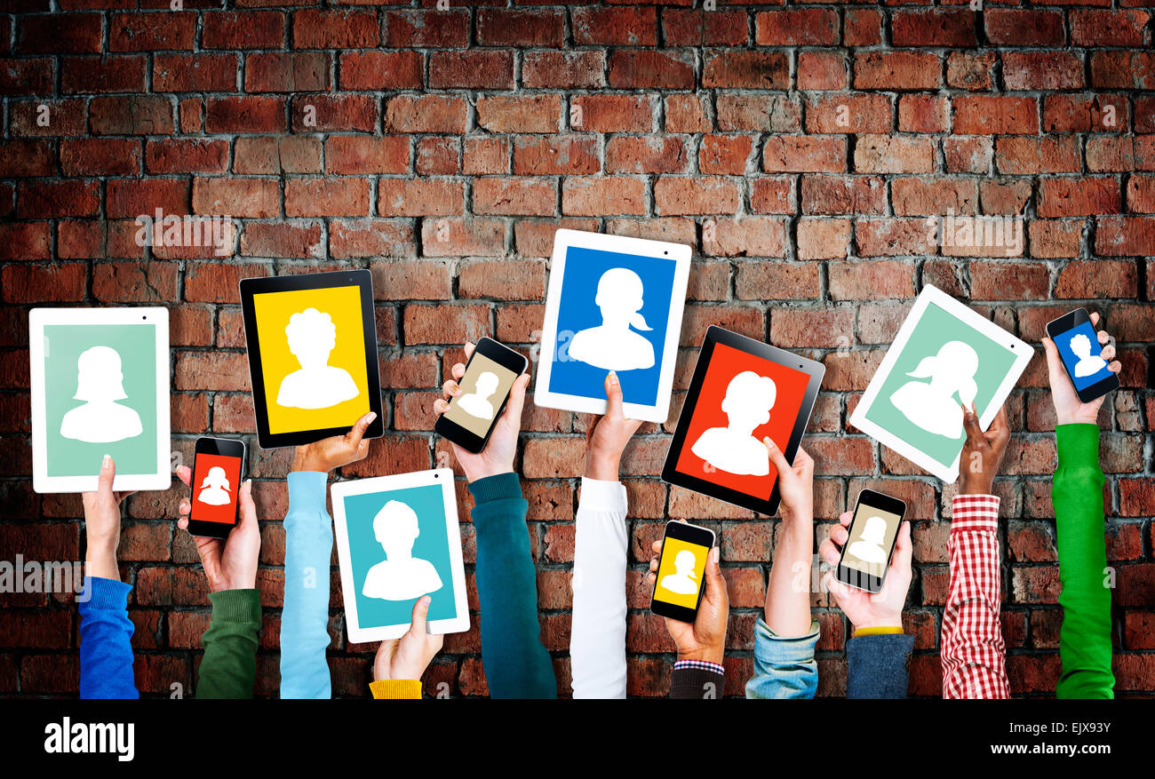 Hands Holding Digital Devices with Avatar Symbol Stock Photo - Alamy