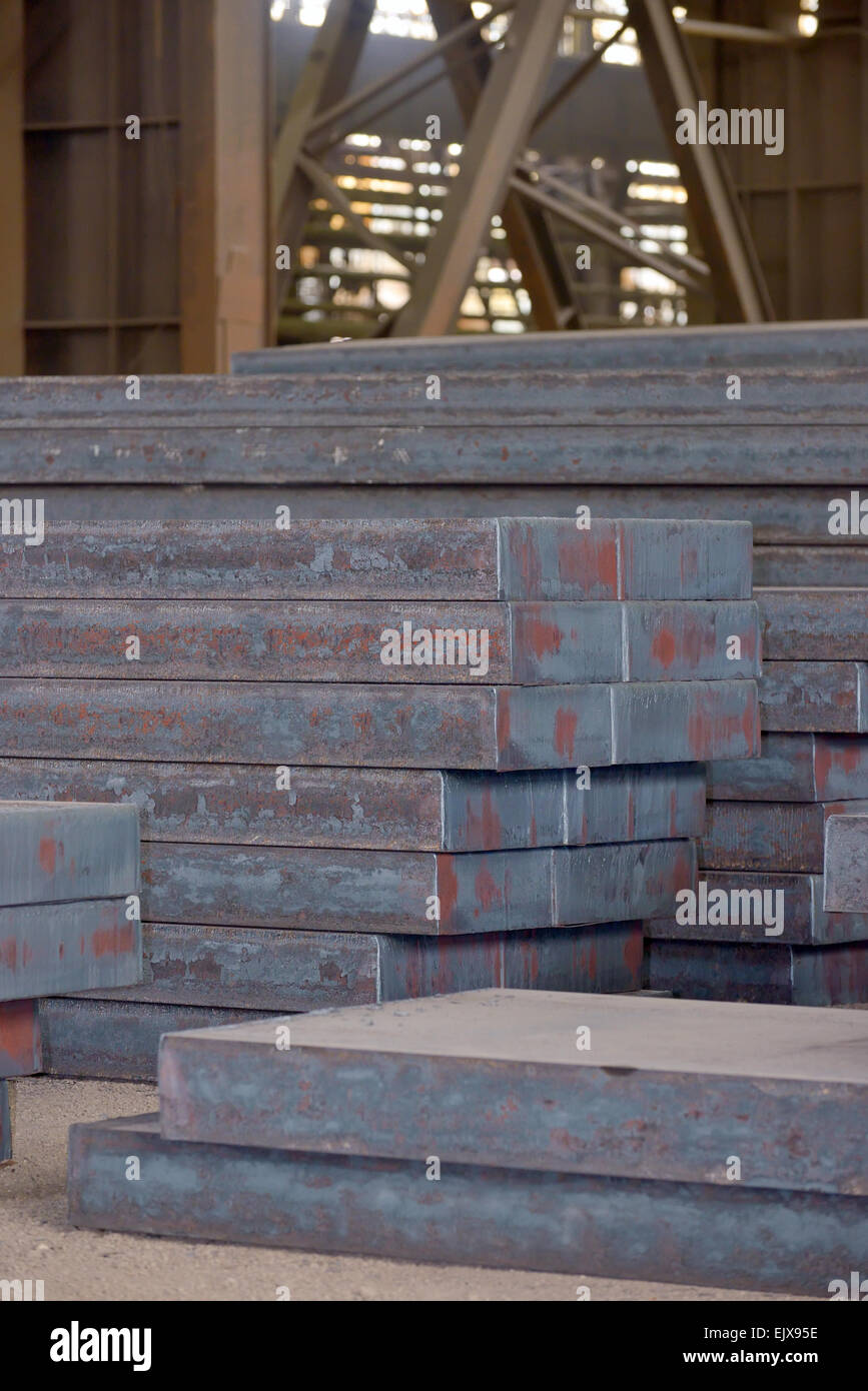 stack of heavy plates inside of plant Stock Photo - Alamy