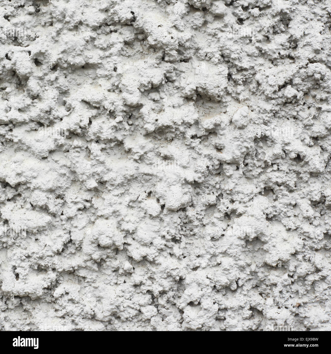 Bumpy concrete wall fragment Stock Photo - Alamy