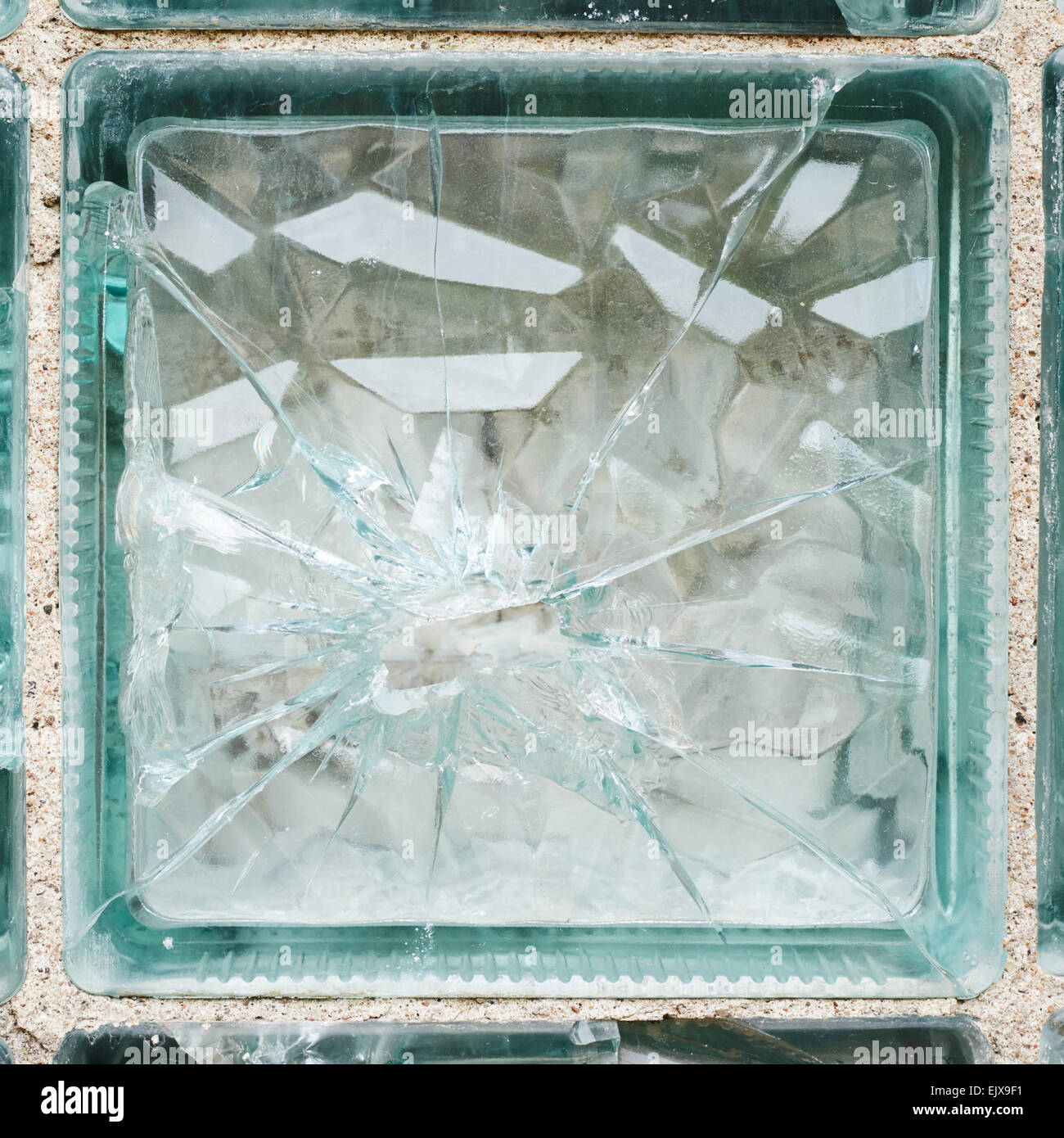 Broken glass brick fragment Stock Photo - Alamy