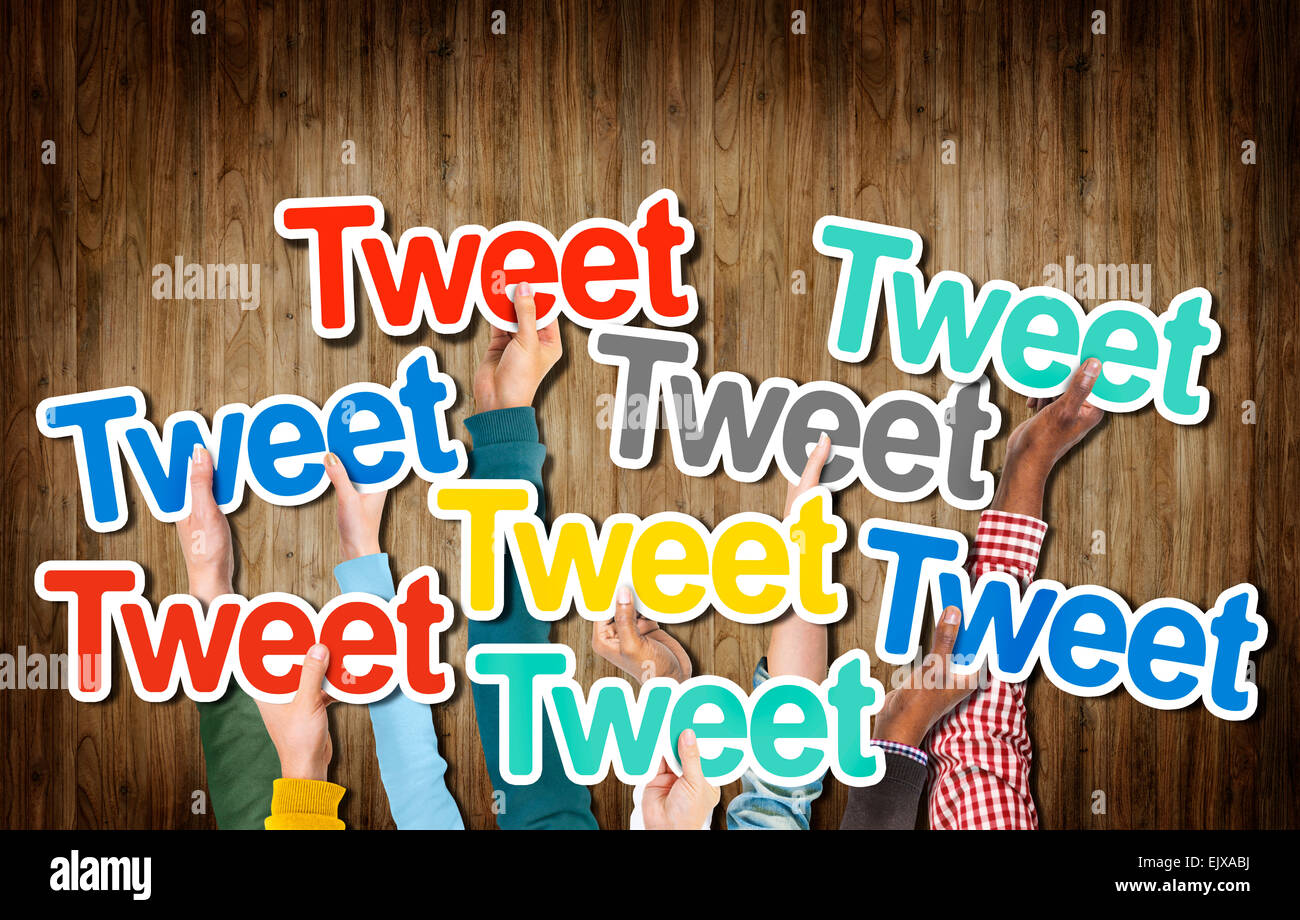 Group of Hands Holding the Word Tweet Stock Photo - Alamy