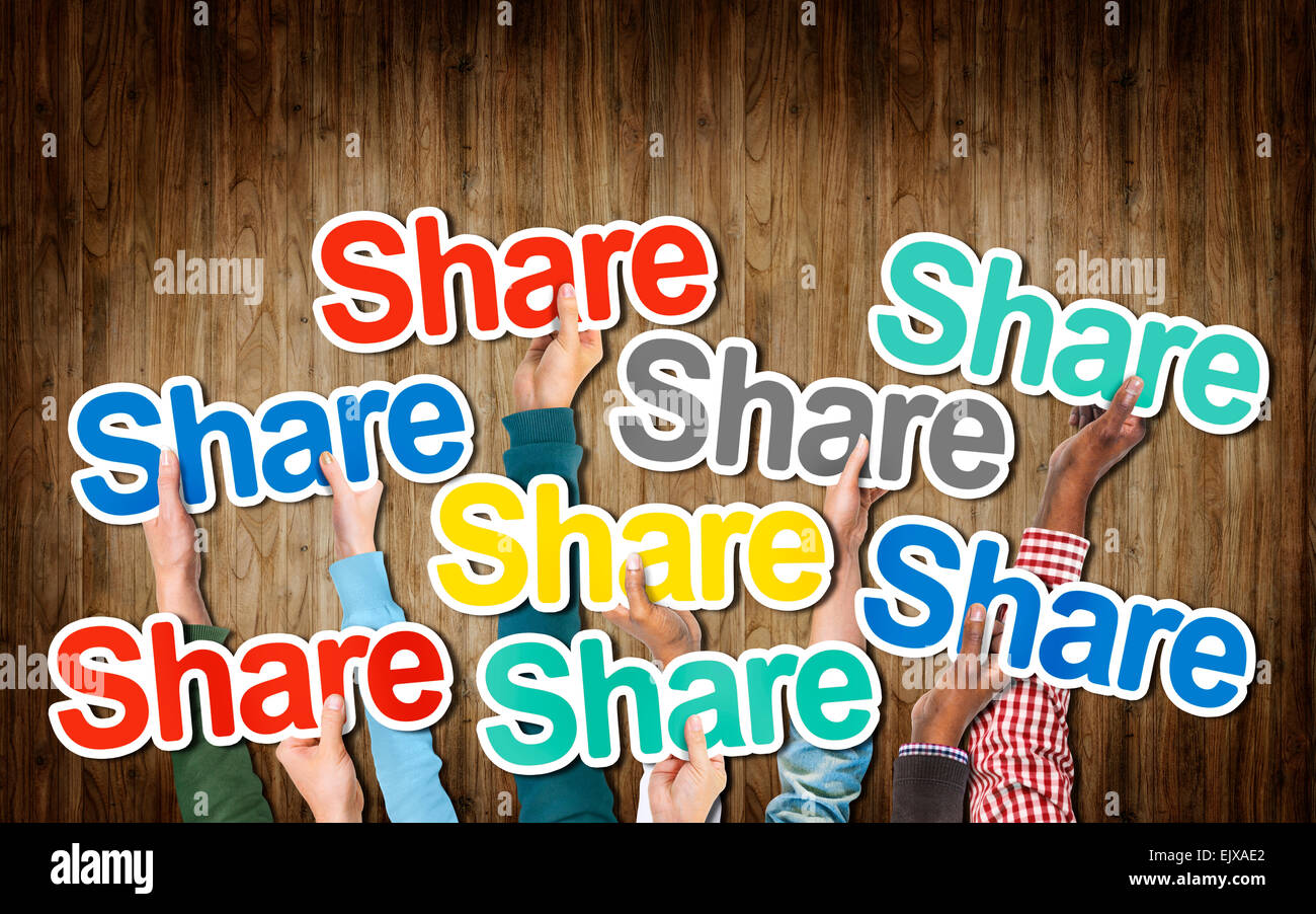 Group of Hands Holding the Word Share Stock Photo - Alamy