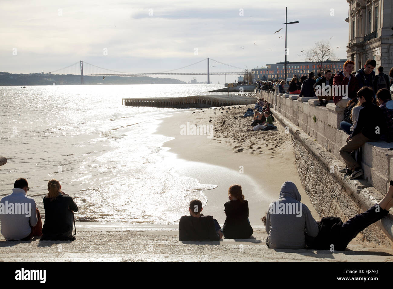 Relaxing along Tagus River Promenade in Lisbon - Portugal Stock Photo ...