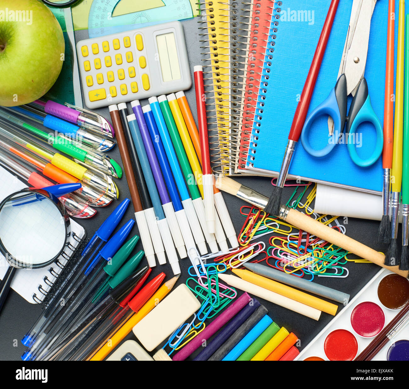 Desk covered with multiple stationery Stock Photo - Alamy