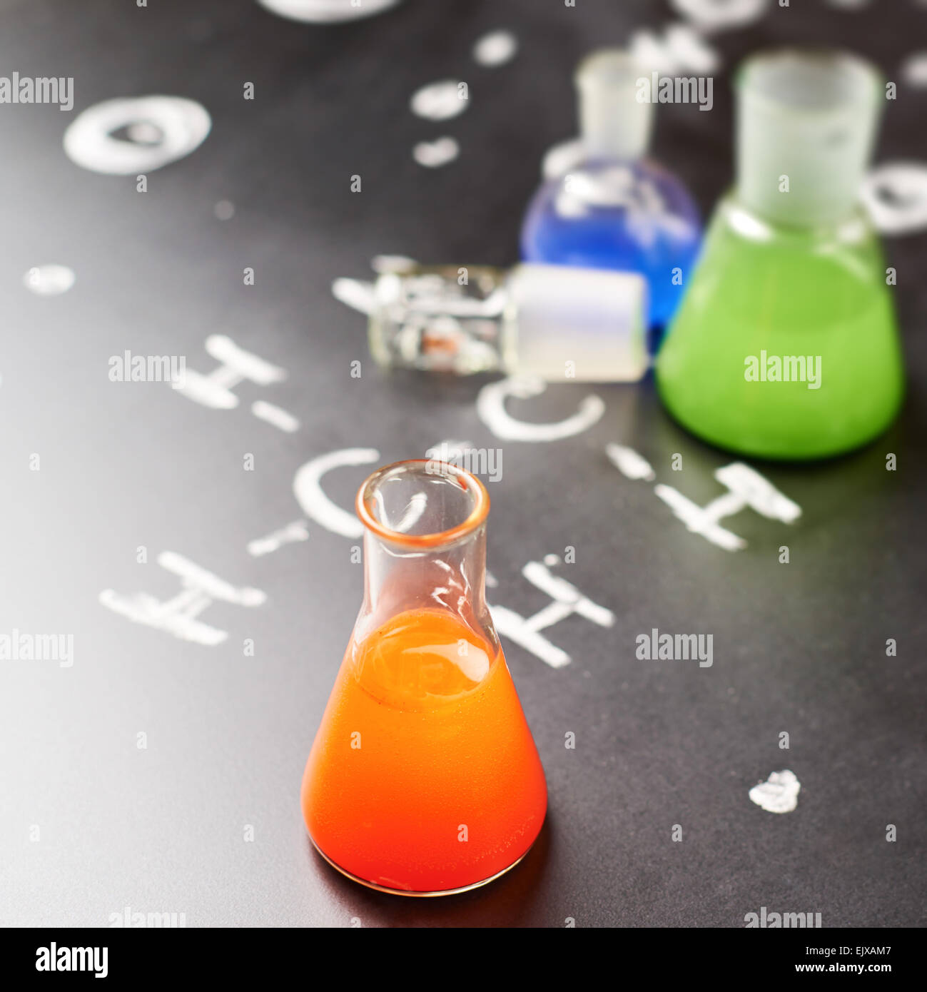 Chemistry tubes filled with colorful liquids Stock Photo - Alamy