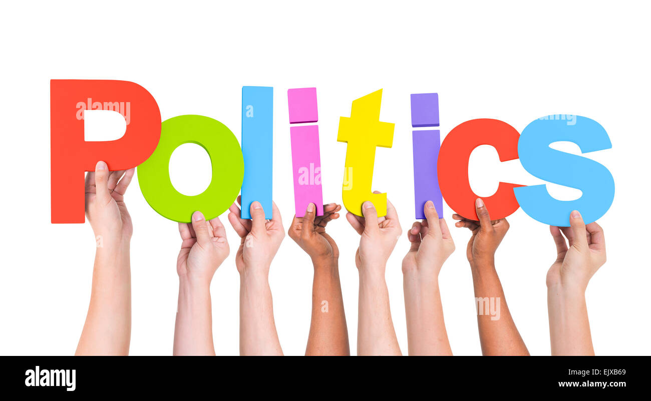 Diverse Hands Holding The Word Politics Stock Photo - Alamy