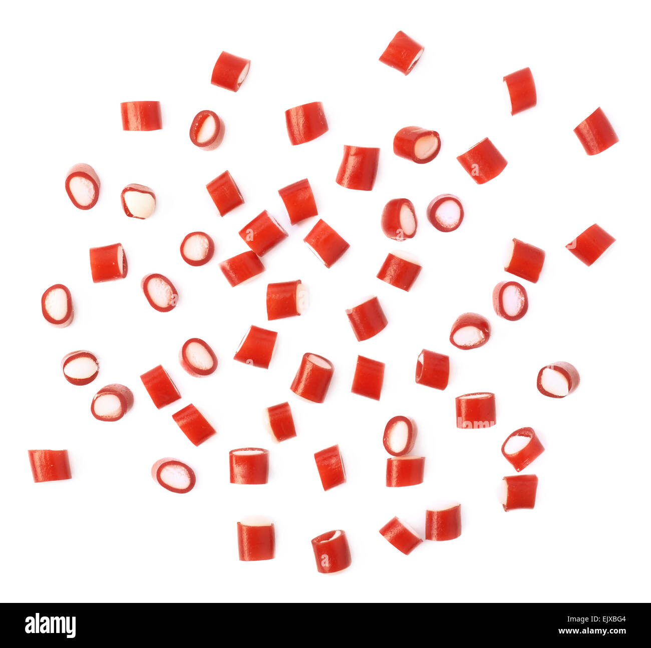 Multiple red candy sweets spilled over the surface Stock Photo - Alamy