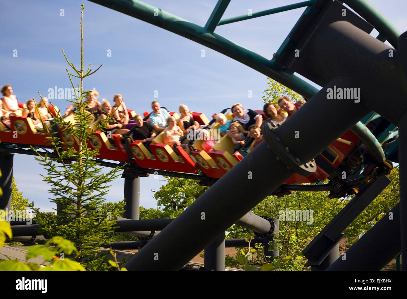 The modern roller coaster in Bakken amusement park Stock Photo - Alamy