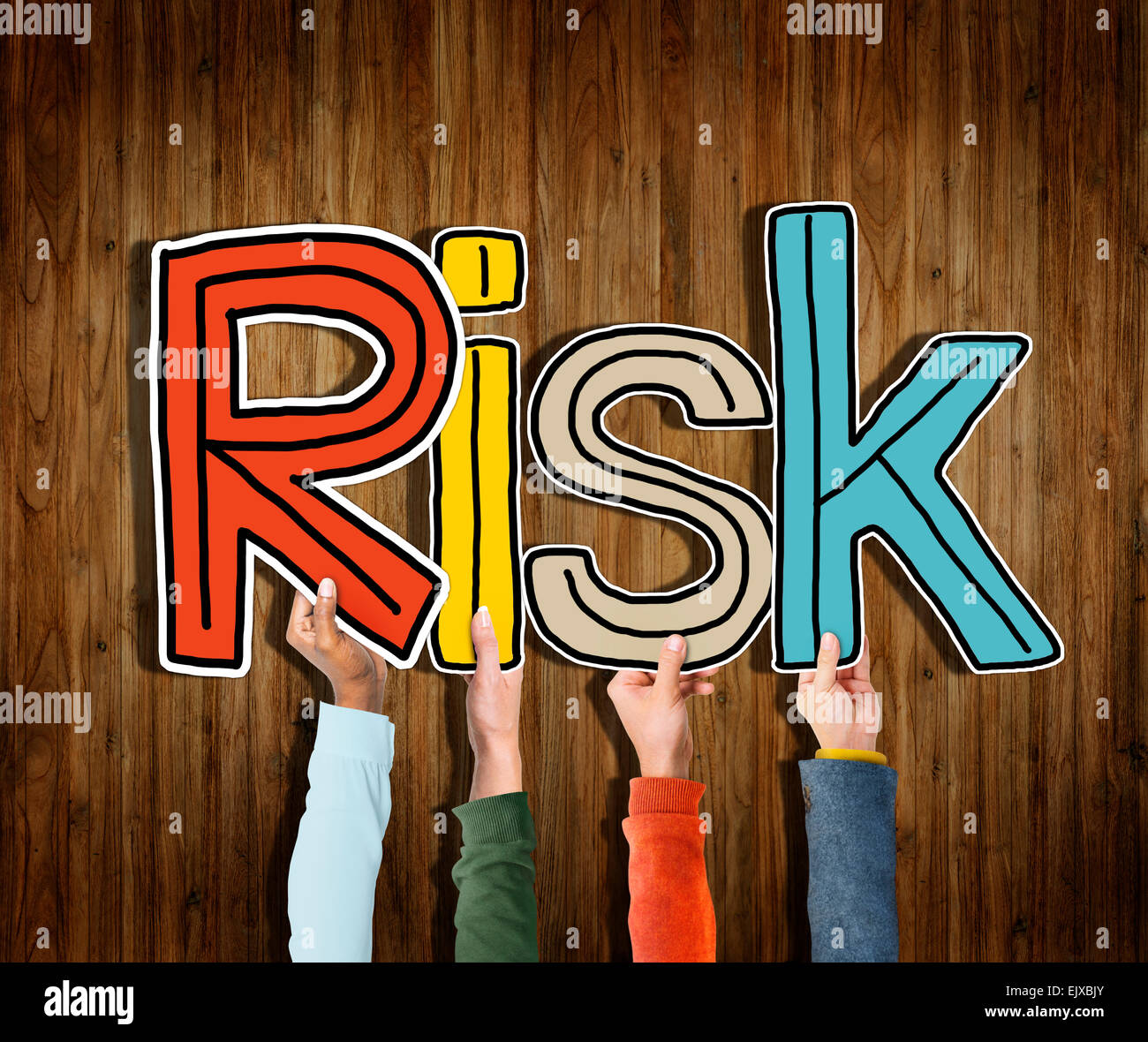 Group of Diverse People's Hands Holding Risk Stock Photo - Alamy