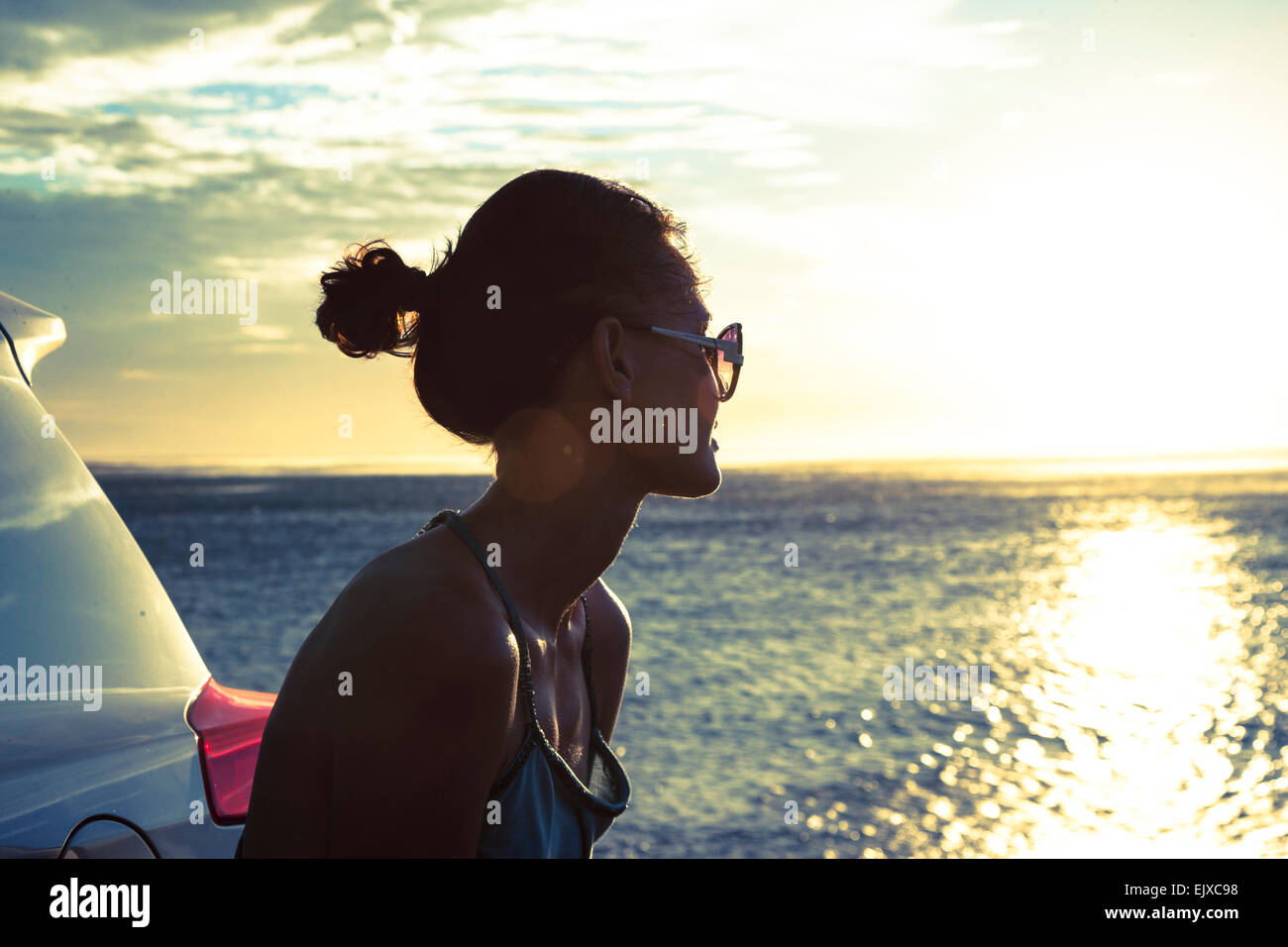 Woman sunrise ponytail hi-res stock photography and images - Alamy