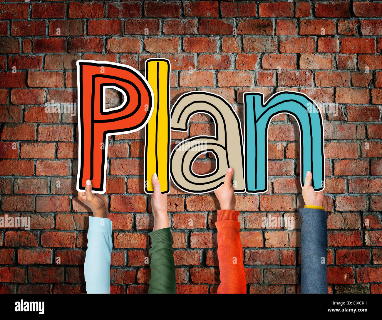 Group of Diverse People's Hands Holding Plan Stock Photo - Alamy
