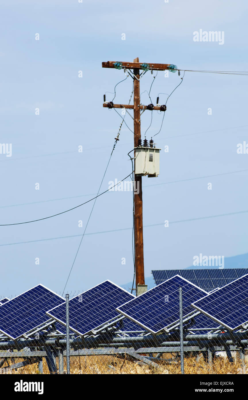 Solar power modules and electricity pylon in Thessaly, Greece Stock ...