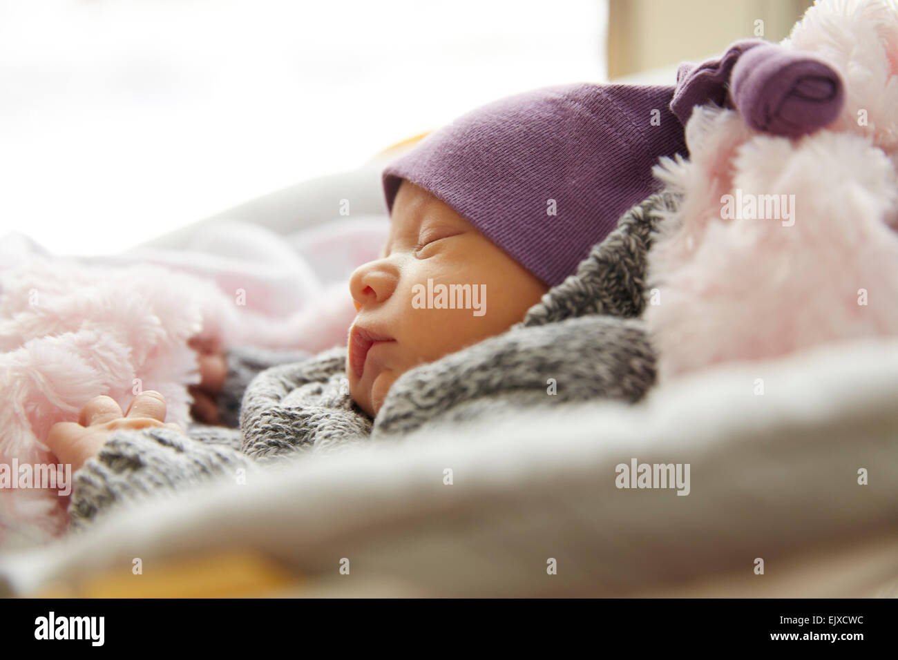 Baby girl inside crib hi-res stock photography and images - Alamy