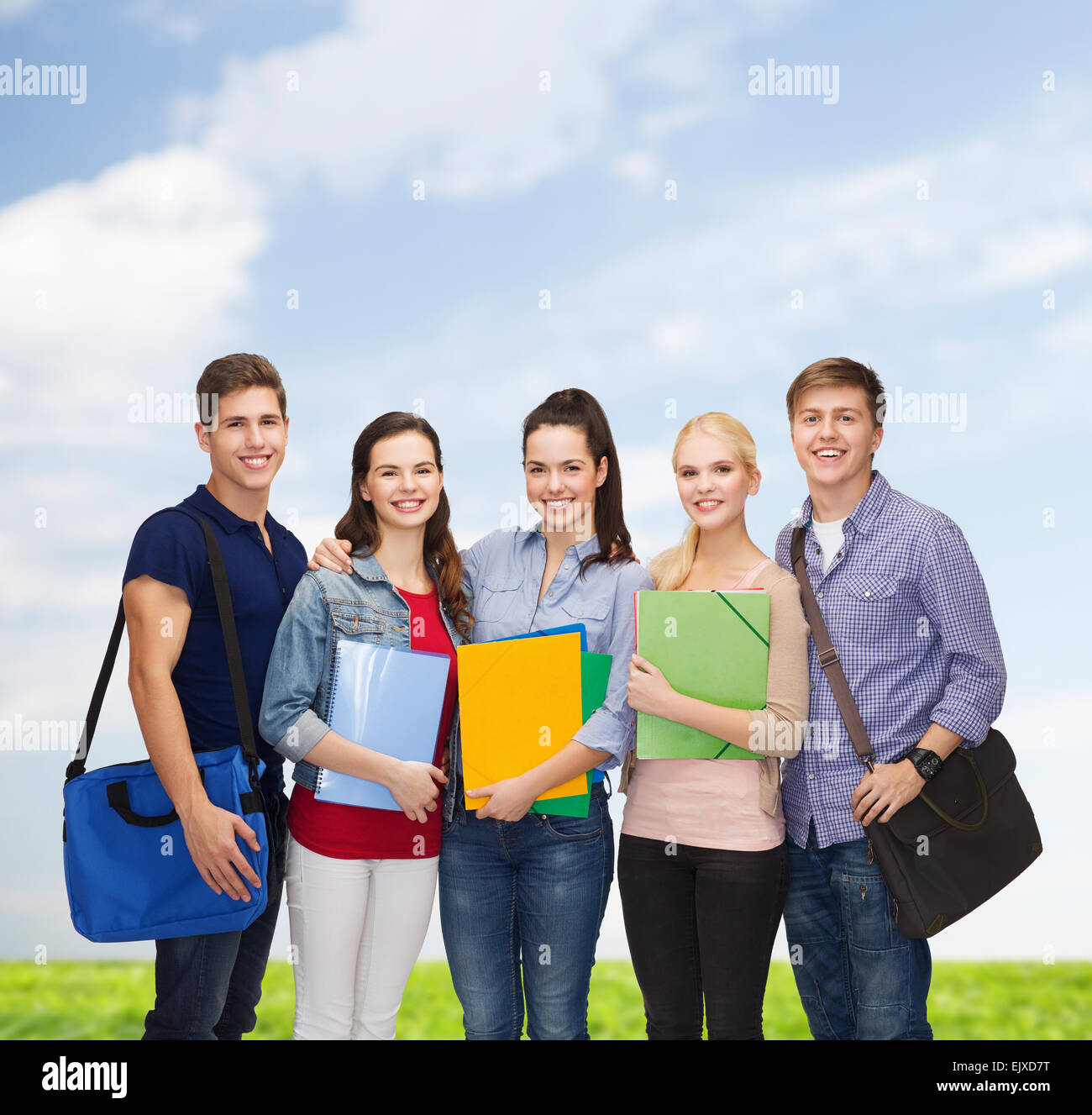 group of smiling students standing Stock Photo - Alamy