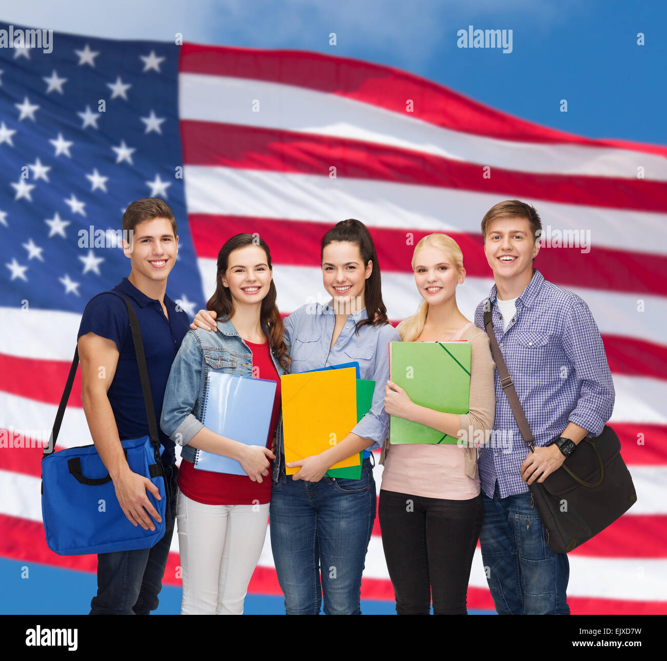 group of smiling students standing Stock Photo - Alamy