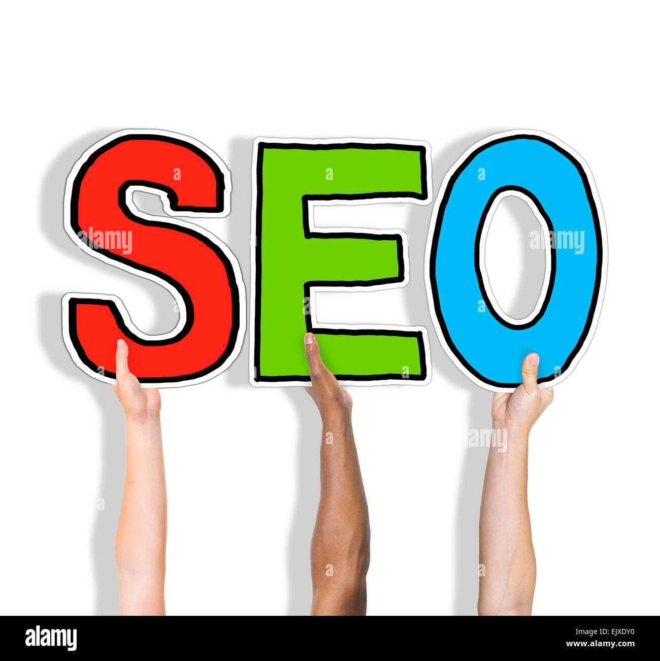 Multiethnic Group of Hands Holding Letter SEO Stock Photo - Alamy
