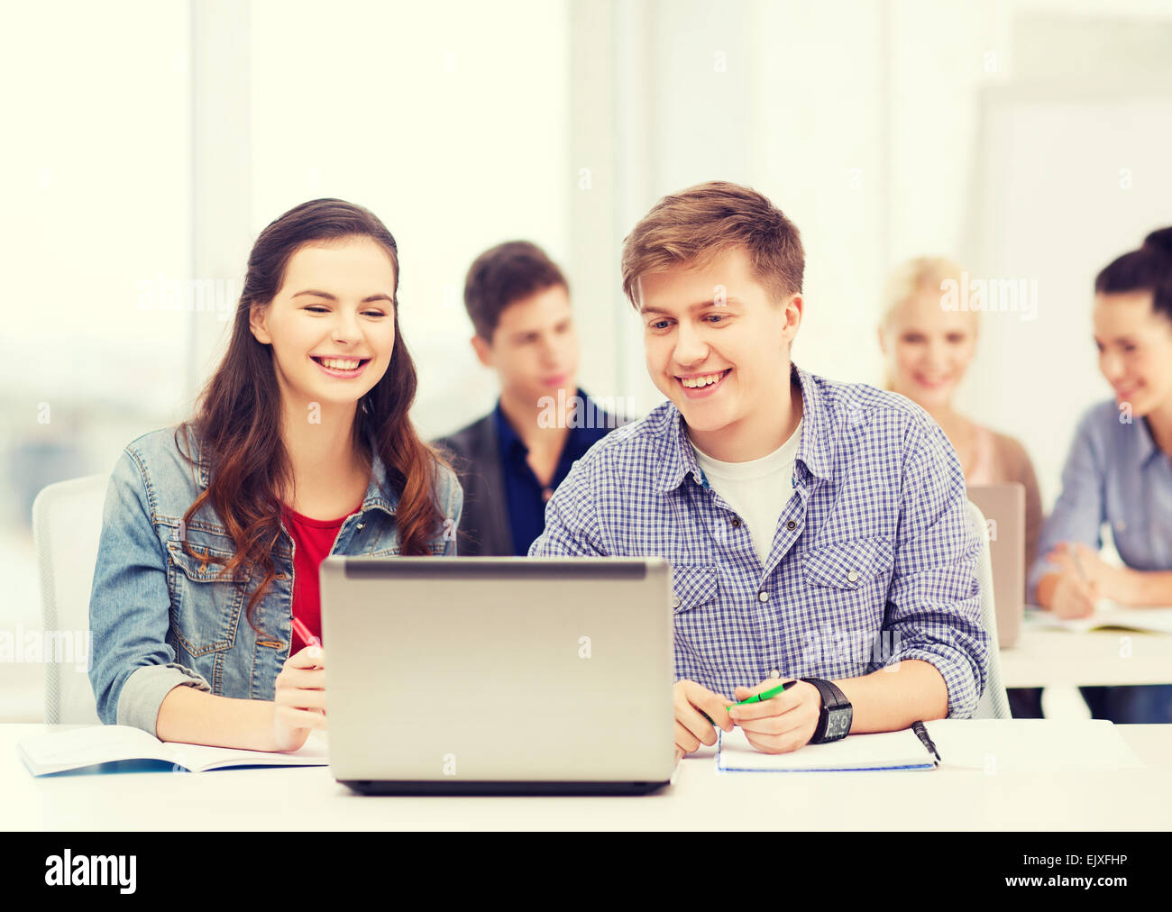 students with laptop and notebooks at school Stock Photo - Alamy