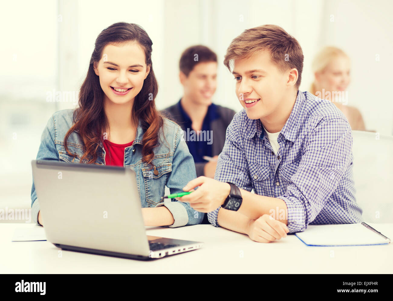 students with laptop and notebooks at school Stock Photo - Alamy
