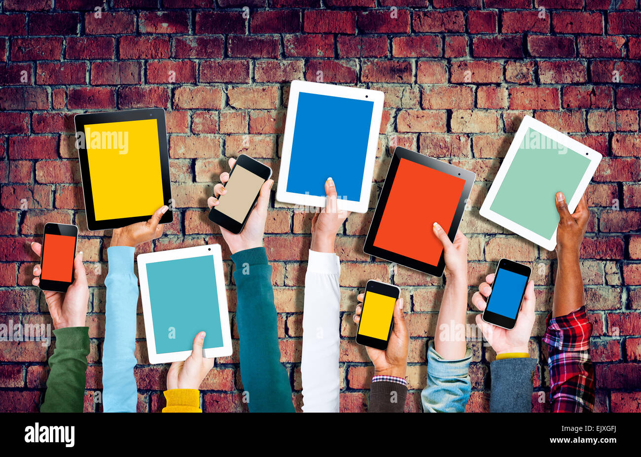 Group of Hands Holding Digital Devices Stock Photo - Alamy