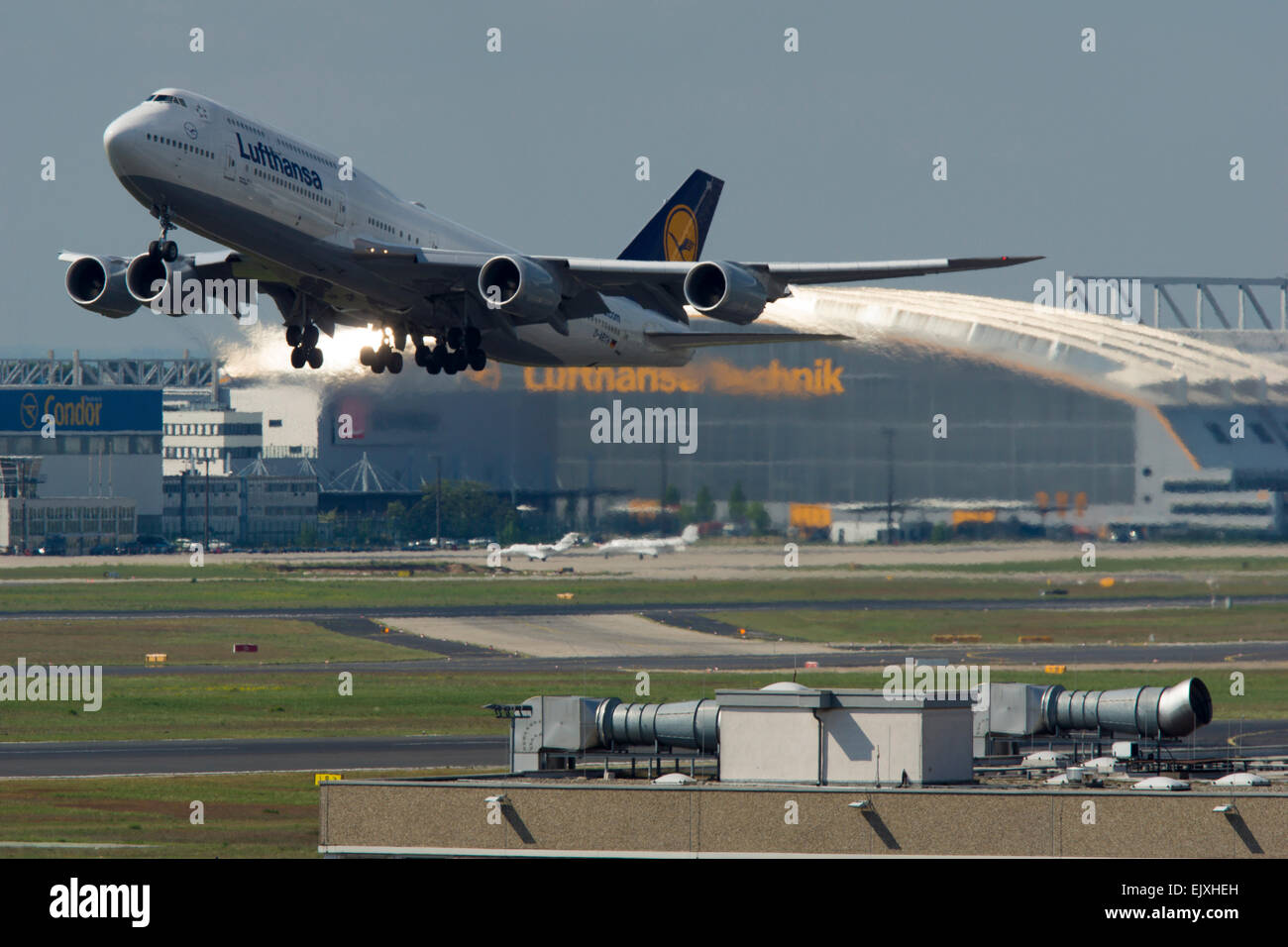 Germany, Frankfurt, Lufthansa Boeing 747 starting in front of ...