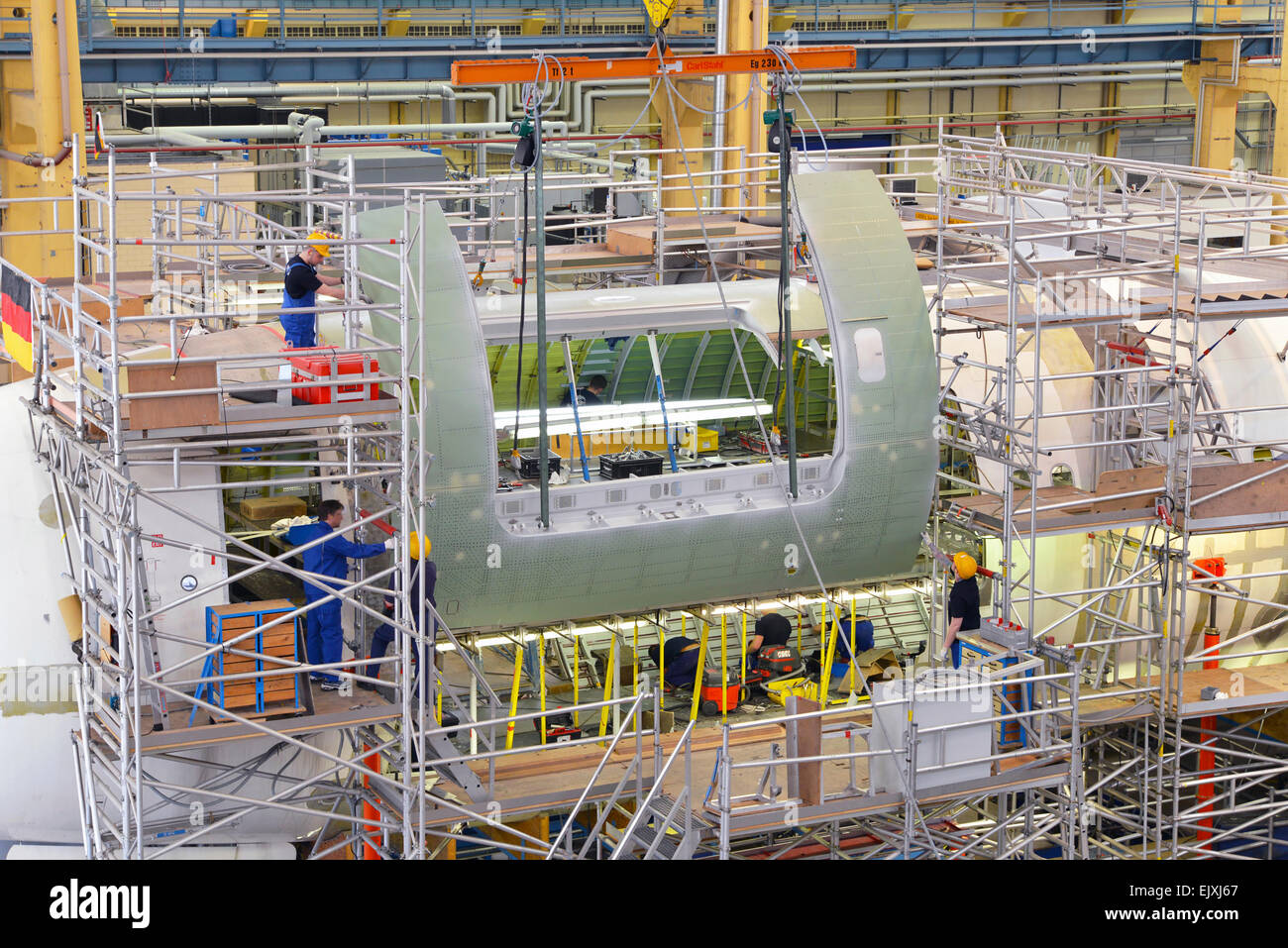 Airplane construction in a hangar Stock Photo - Alamy