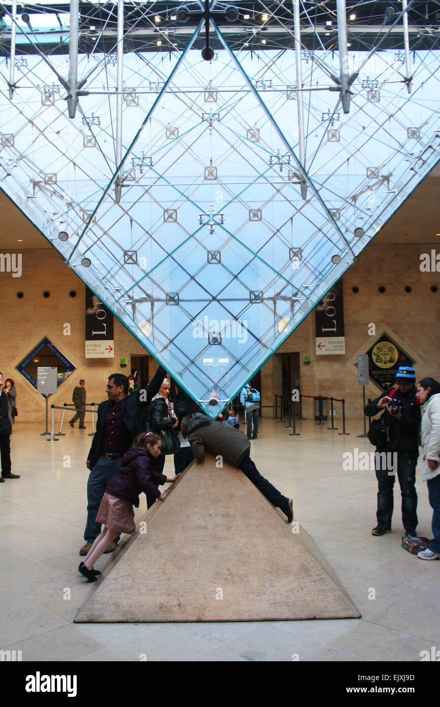 Inverted glass prims in Louvre Museum in Paris, France Stock Photo - Alamy
