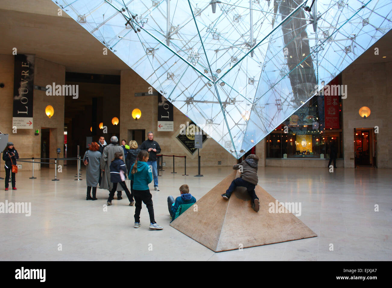 Inverted glass prims in Louvre Museum in Paris, France Stock Photo - Alamy