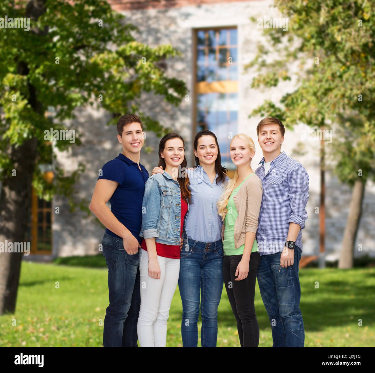 group of smiling students standing Stock Photo - Alamy