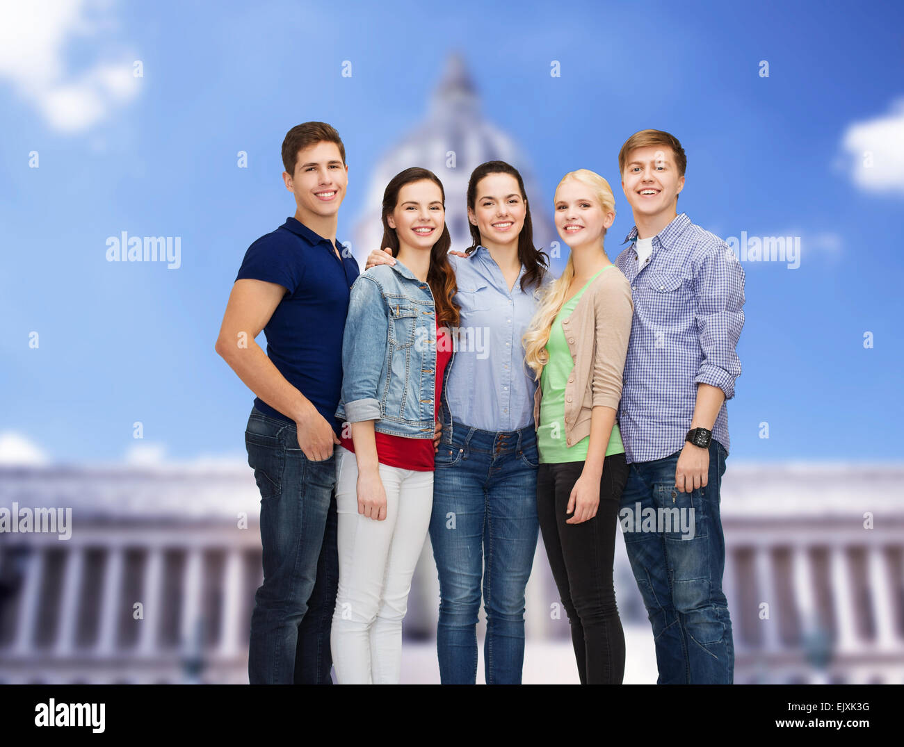group of smiling students standing Stock Photo - Alamy