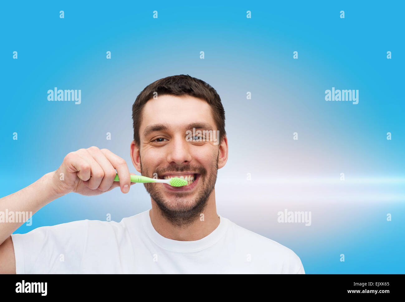 Man white teeth smile toothpaste hi-res stock photography and images ...