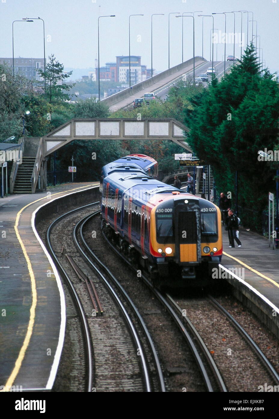 AJAXNETPHOTO - 2006. WOOLSTON,ENGLAND - THE TRAIN WAITING AT PLATFORM ...