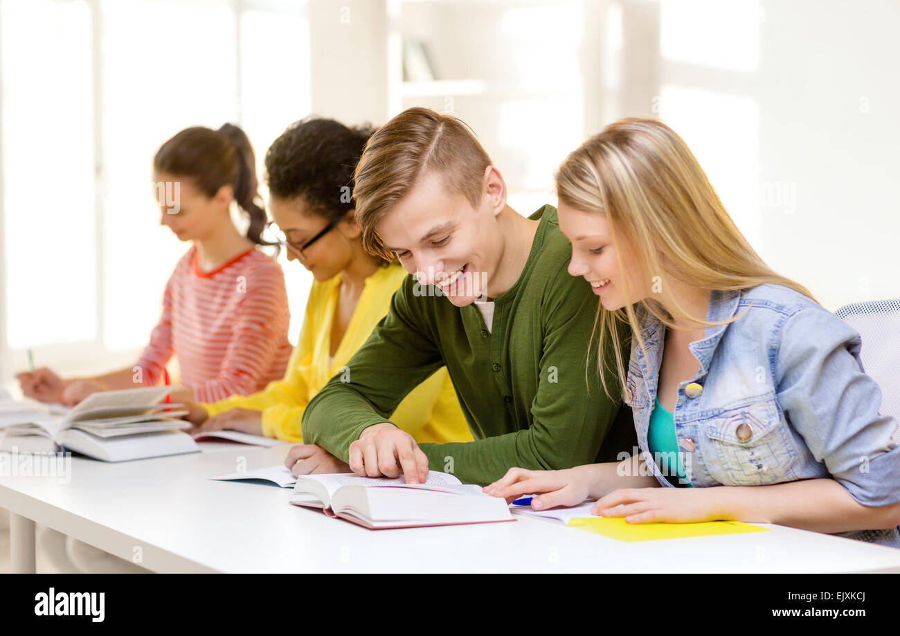 students with textbooks and books at school Stock Photo - Alamy