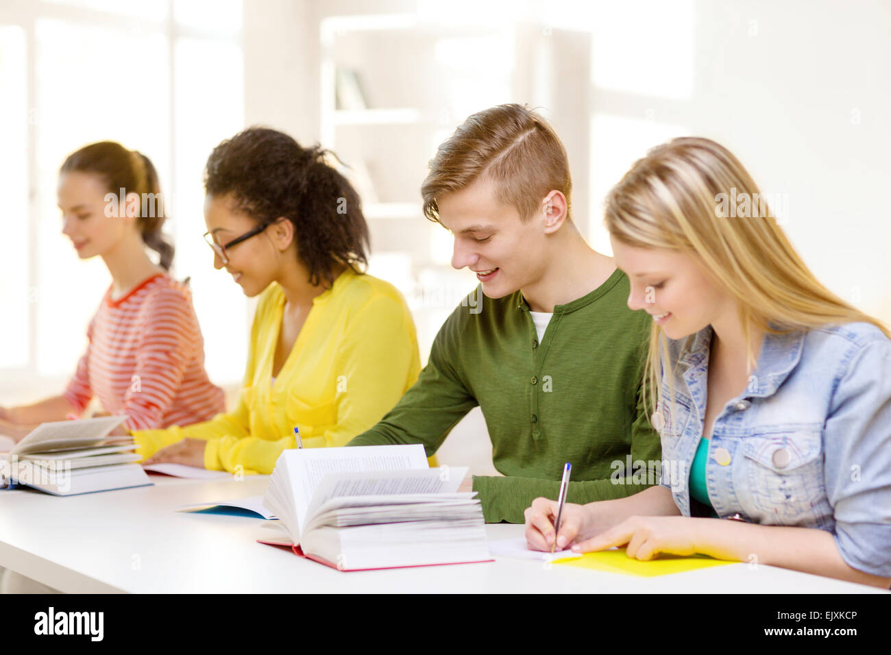 students with textbooks and books at school Stock Photo - Alamy