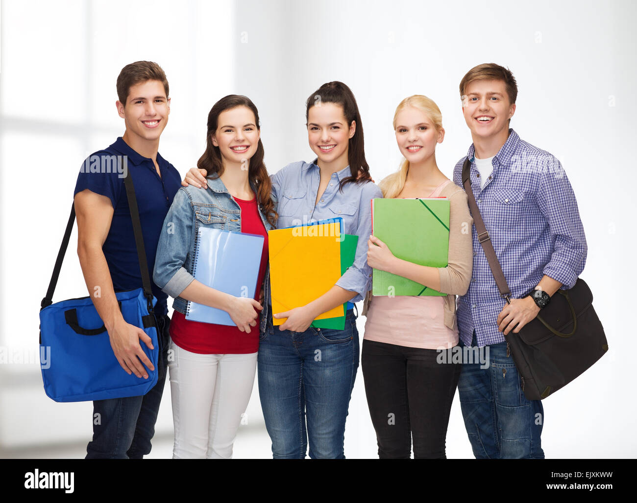 group of smiling students standing Stock Photo - Alamy