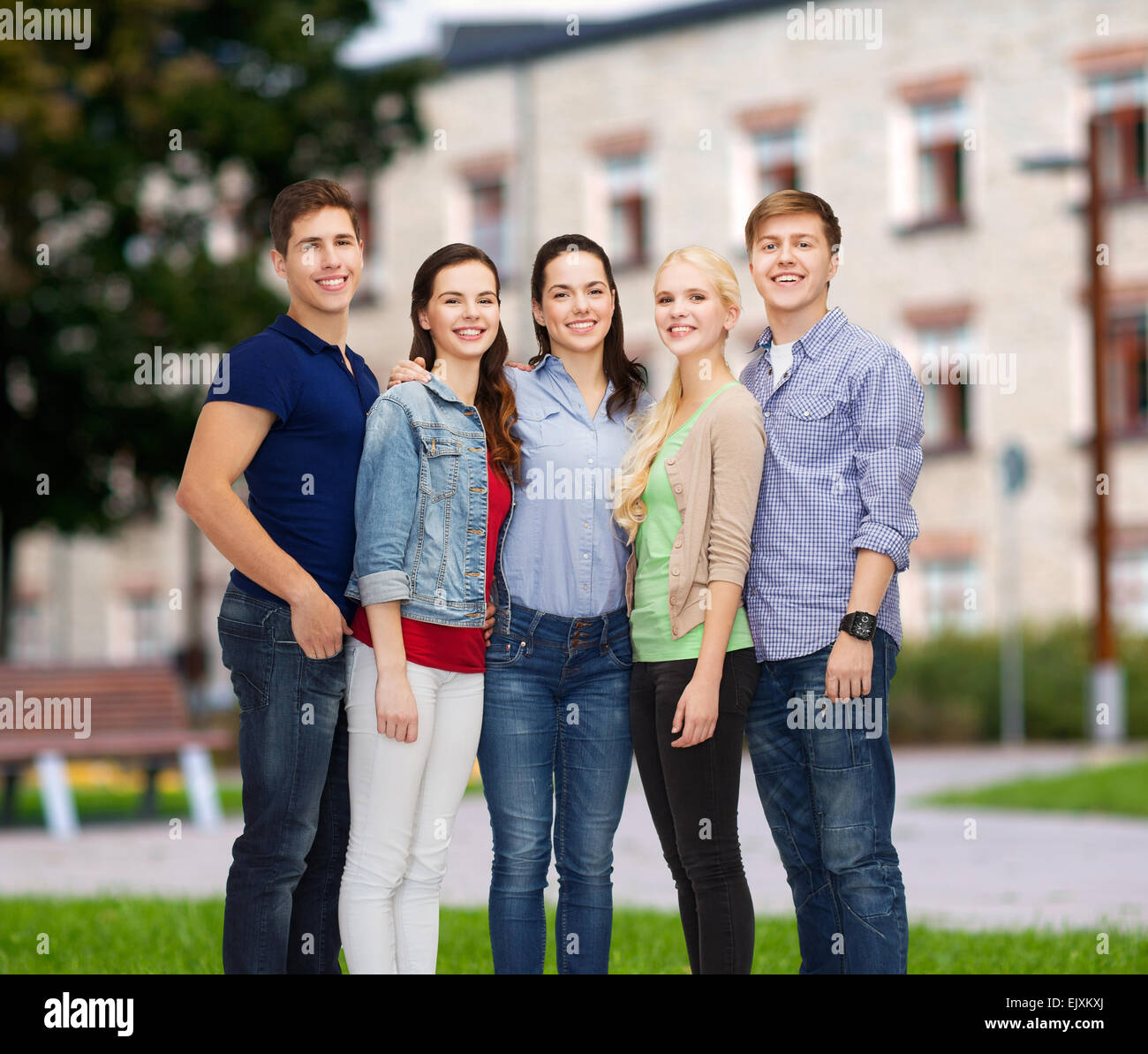 group of smiling students standing Stock Photo - Alamy