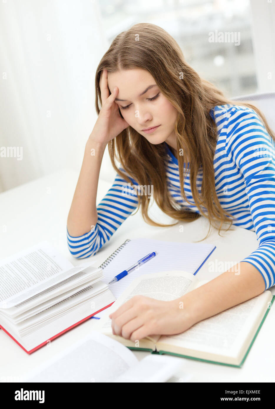 stressed student girl with books Stock Photo - Alamy