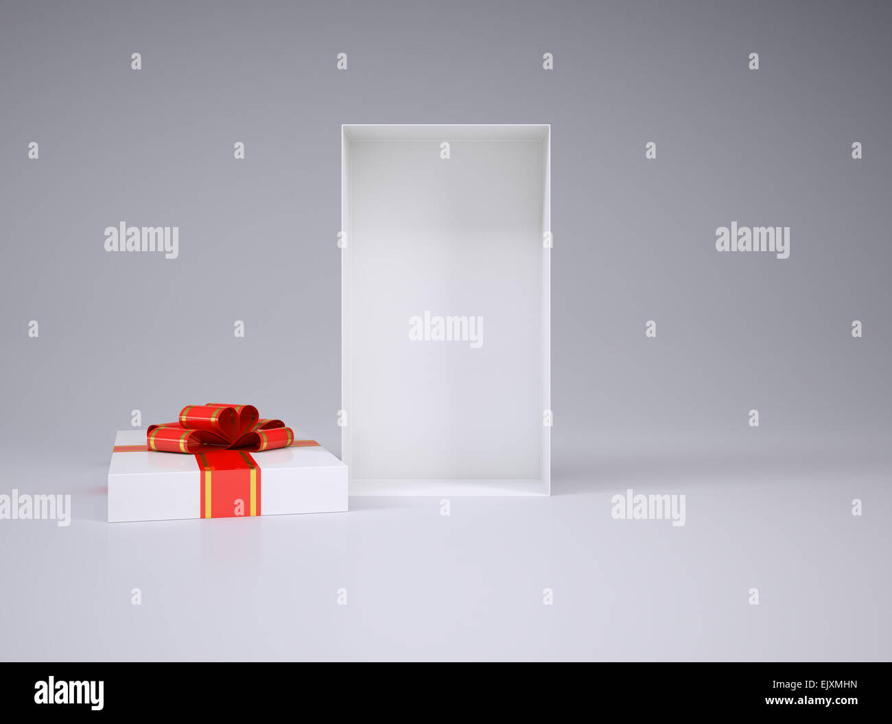 Open empty gift box and red bow Stock Photo - Alamy