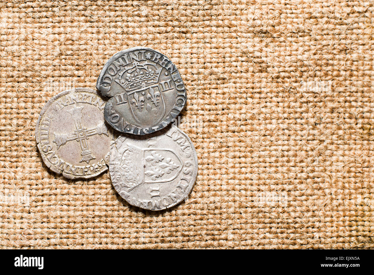 A lot of old silver coins on the old cloth Stock Photo - Alamy