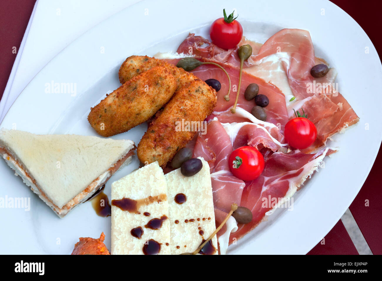 Ham, nuggets and sandwiches on a plate Stock Photo - Alamy