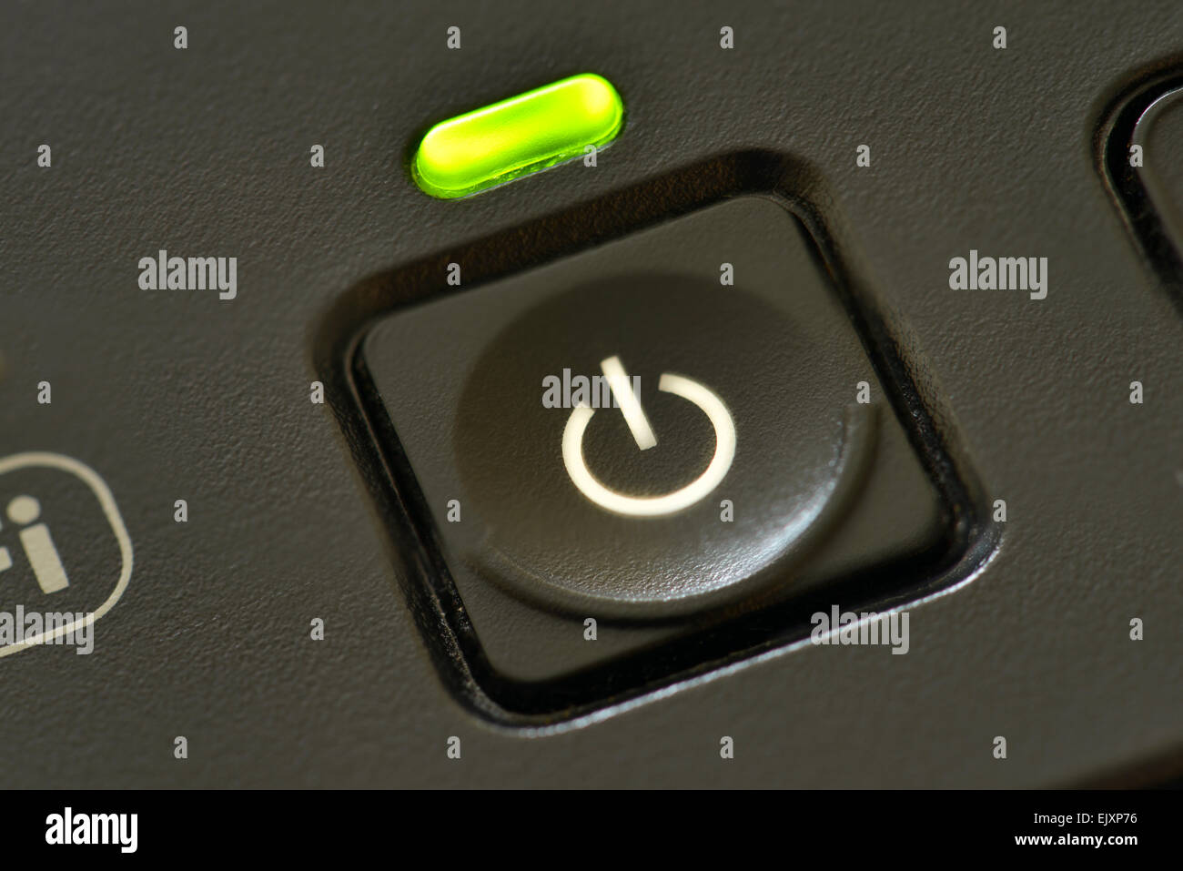 Power button on an electronic device Stock Photo - Alamy