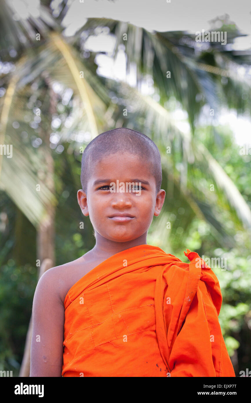 Buddhist monk boy orange hi-res stock photography and images - Alamy