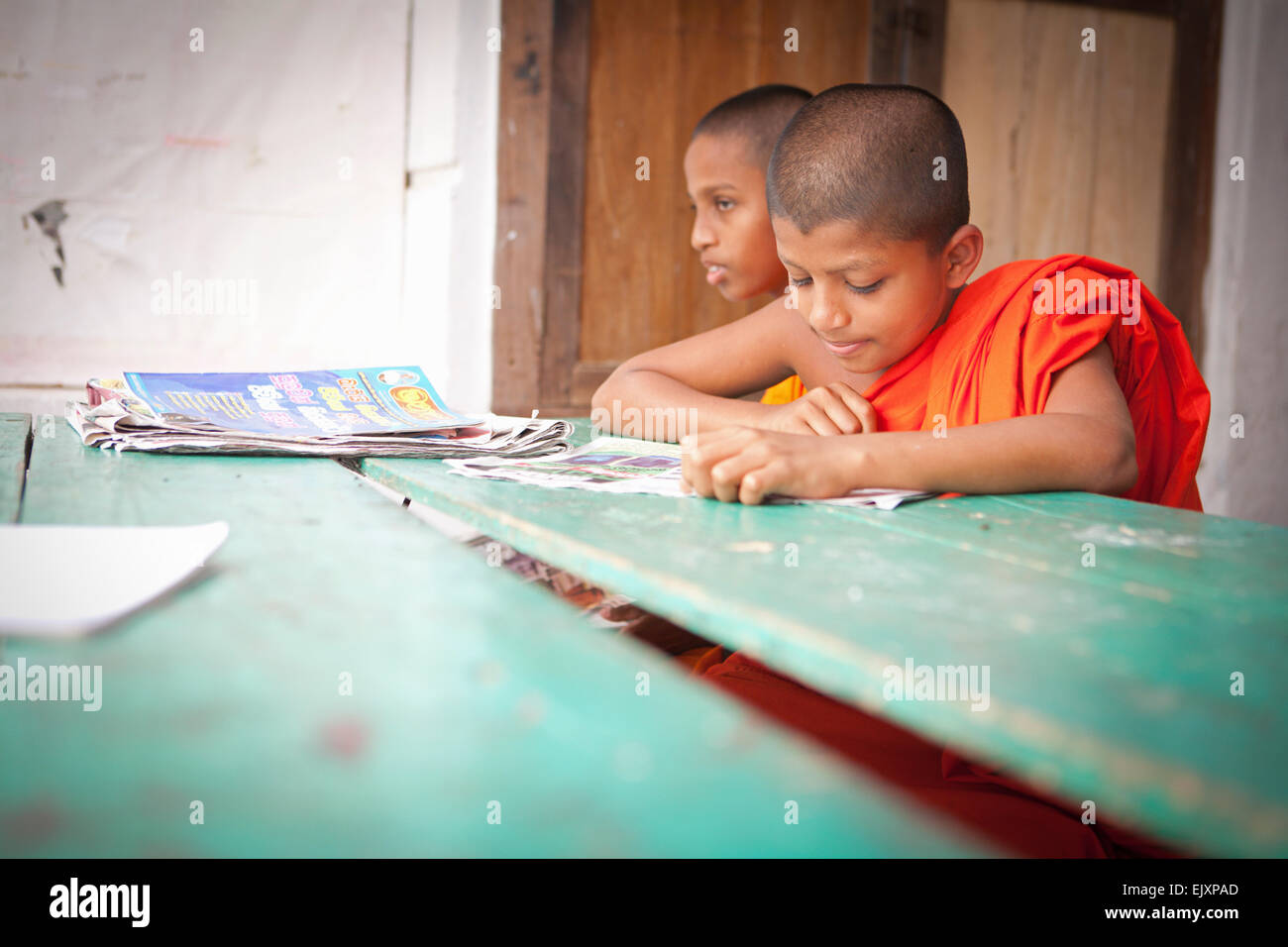 BUDDHIST MONKS STUDYING AT TEMPLE SCHOOL NEAR UNAWATUNA Stock Photo - Alamy