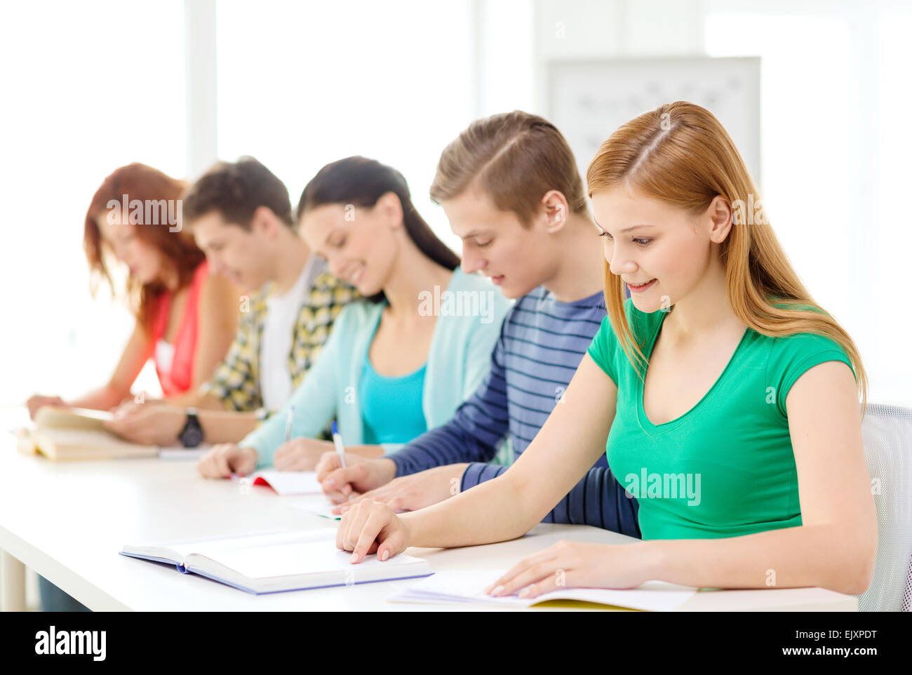 students with textbooks and books at school Stock Photo - Alamy