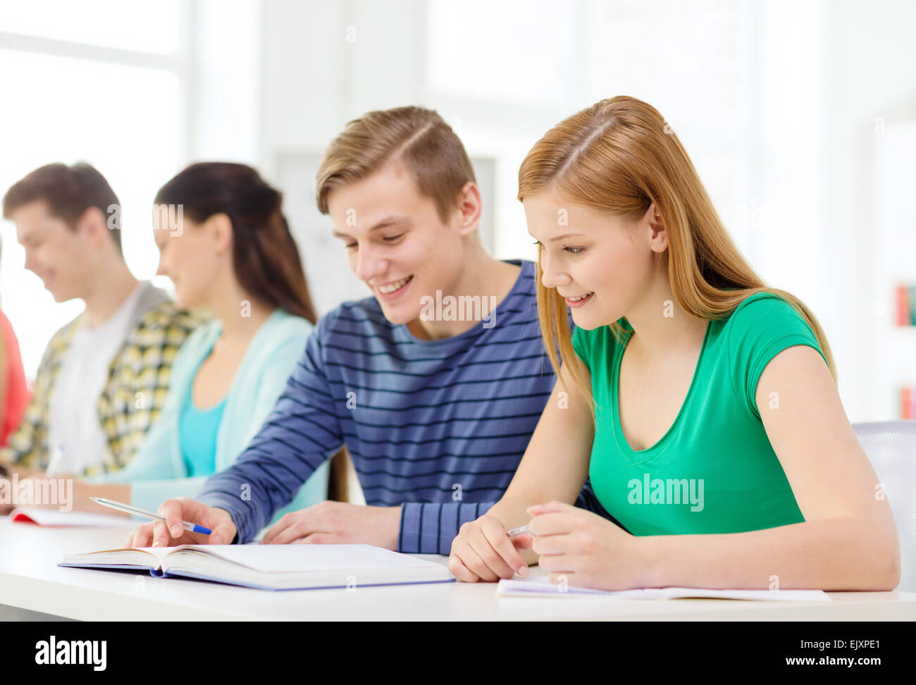 students with textbooks and books at school Stock Photo - Alamy