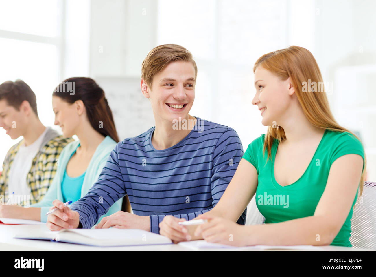 students with textbooks and books at school Stock Photo - Alamy