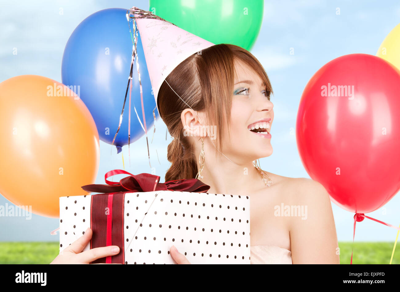party girl with balloons and gift box Stock Photo - Alamy