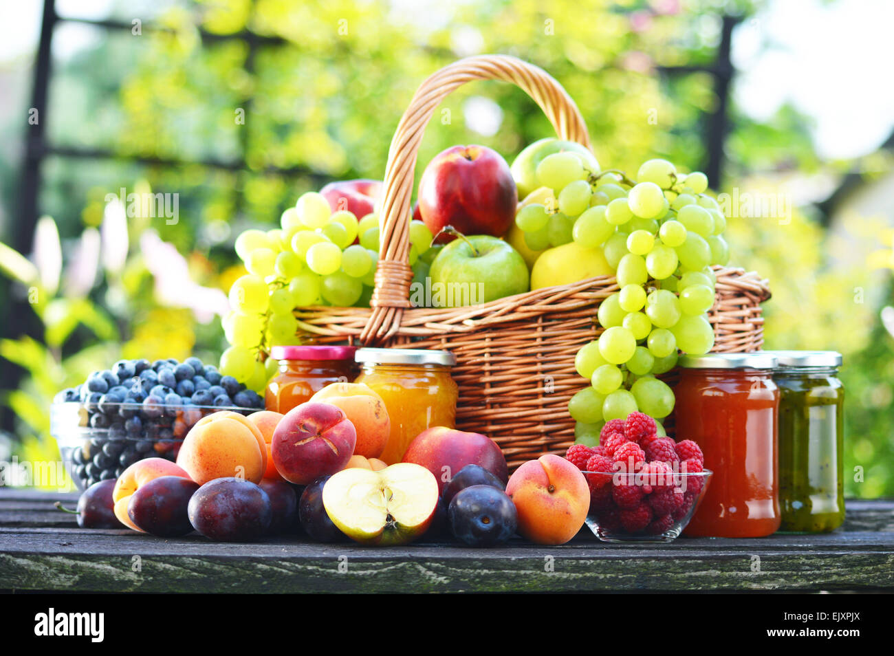 Fresh ripe organic fruits in the garden. Balanced diet Stock Photo - Alamy