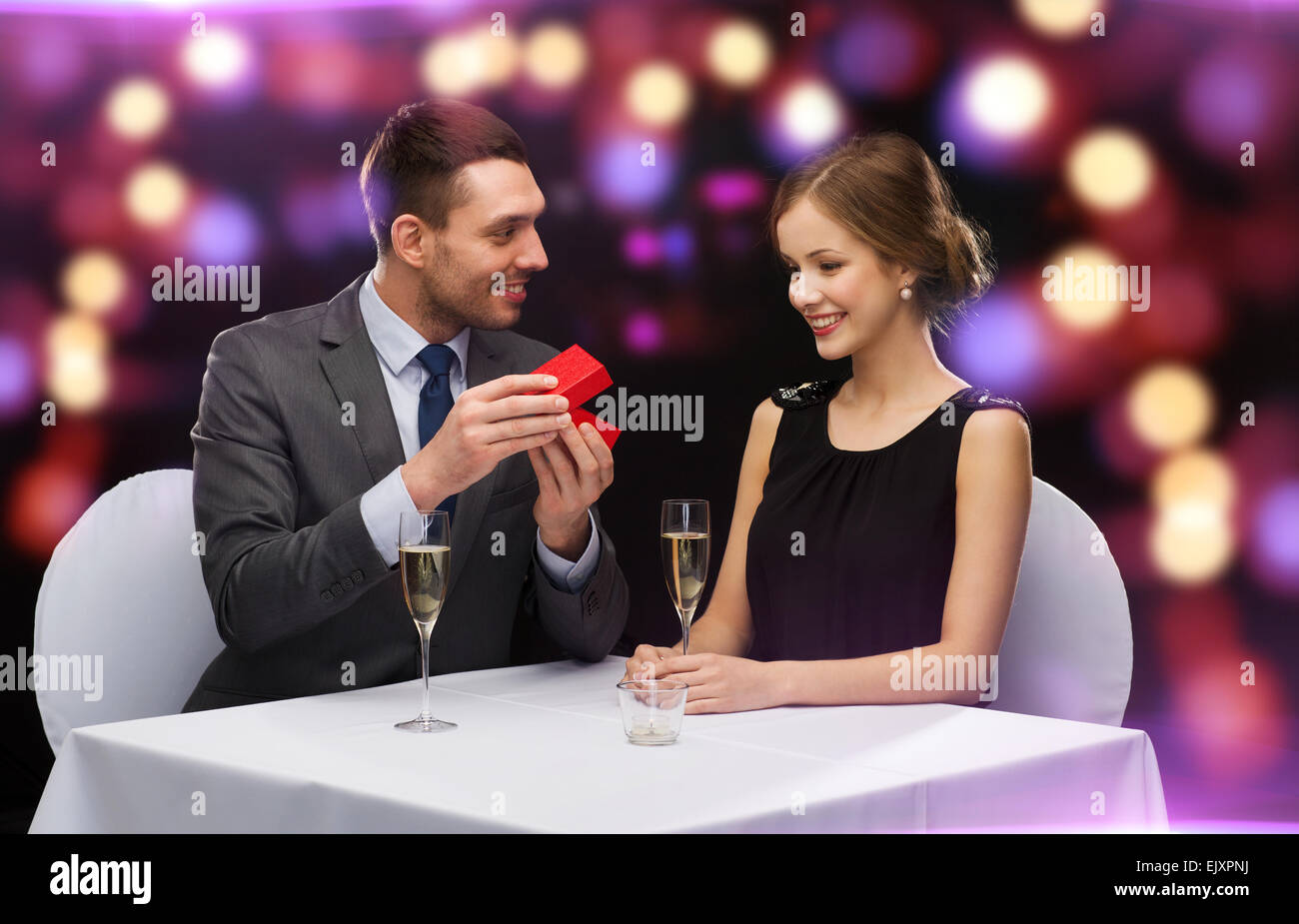 Excited black woman boyfriend hi-res stock photography and images - Alamy